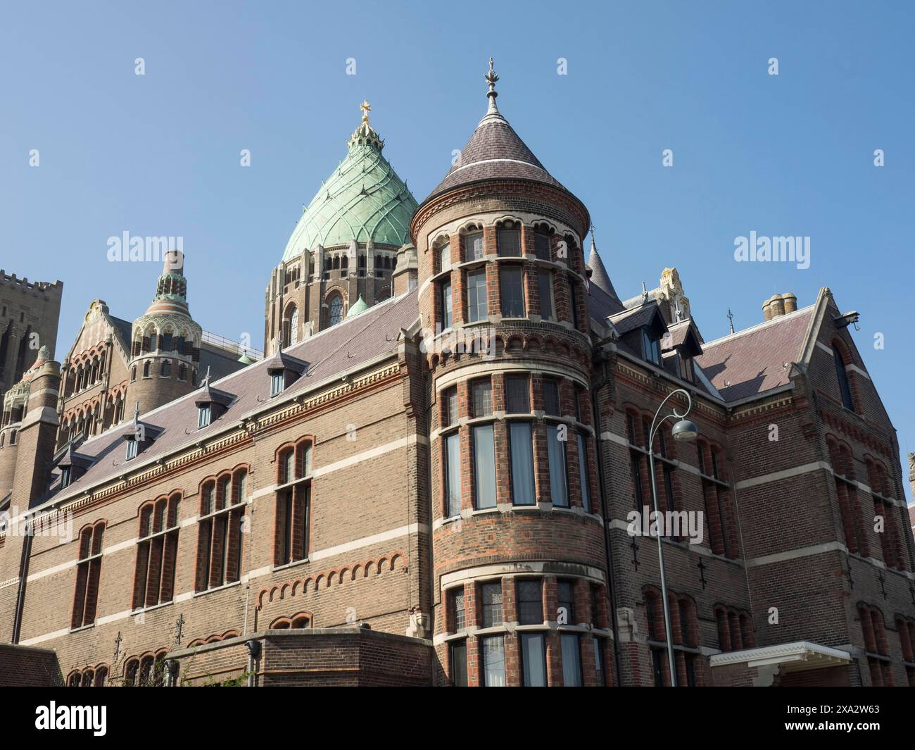 Historic Gothic church with imposing towers and multiple windows under ...