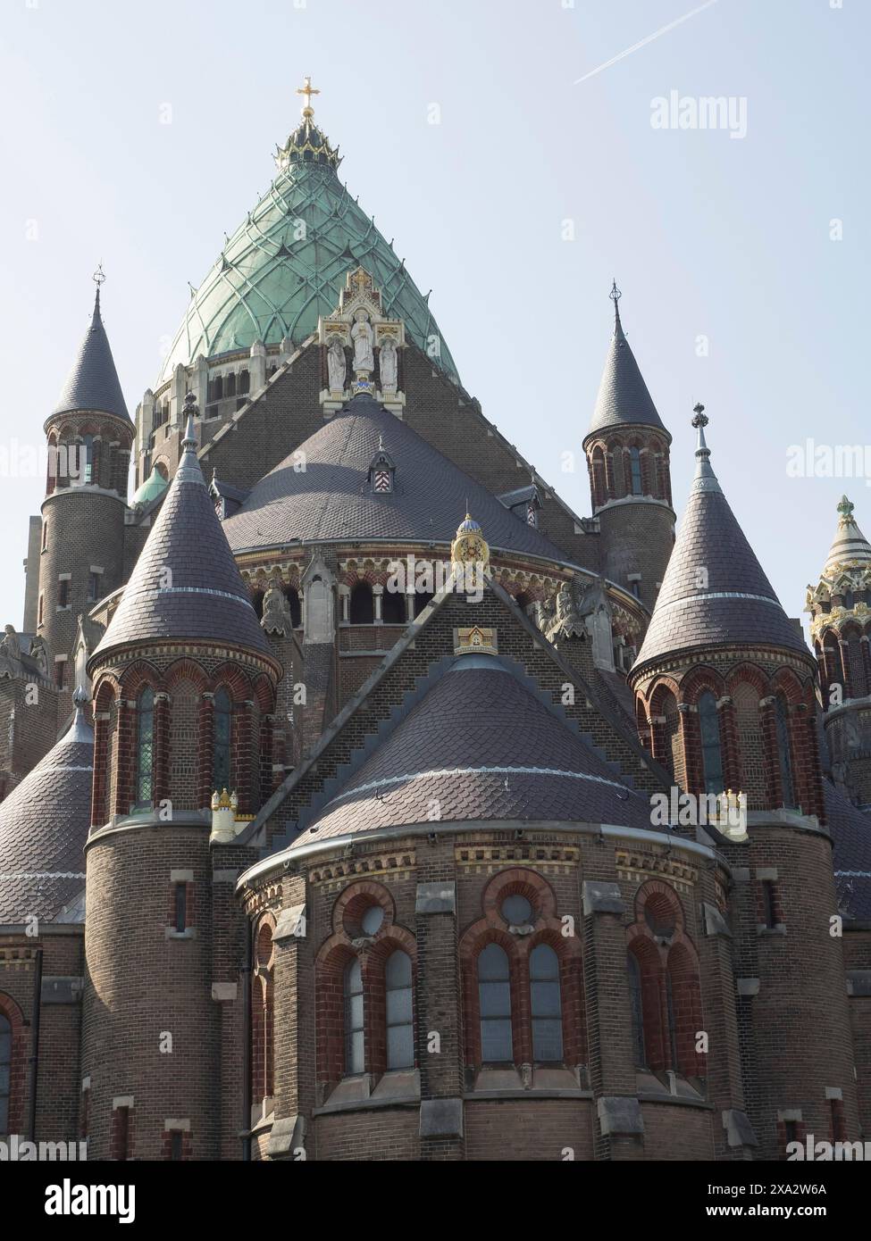 A magnificent Gothic cathedral with a green dome, rich in architectural ...