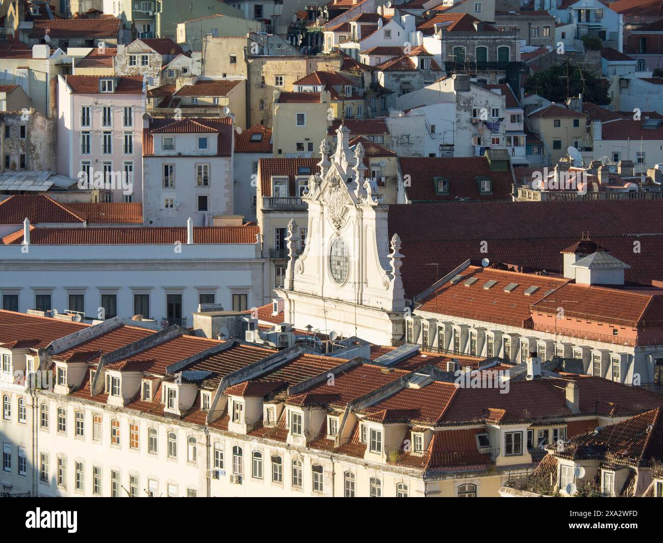Aerial view of red roofs and white buildings in an old town with ...