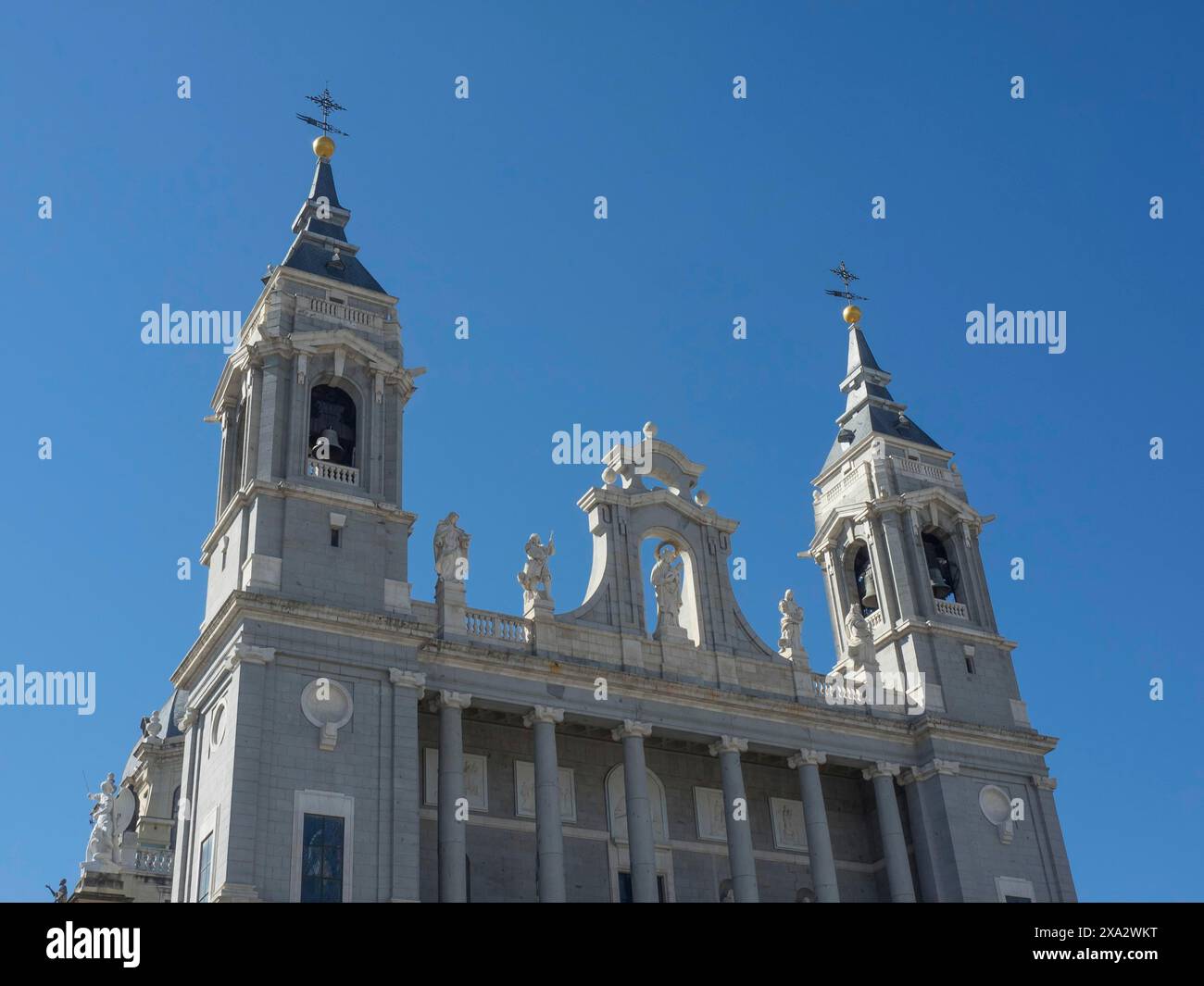 Front view of a church with high towers and detailed architectural ...