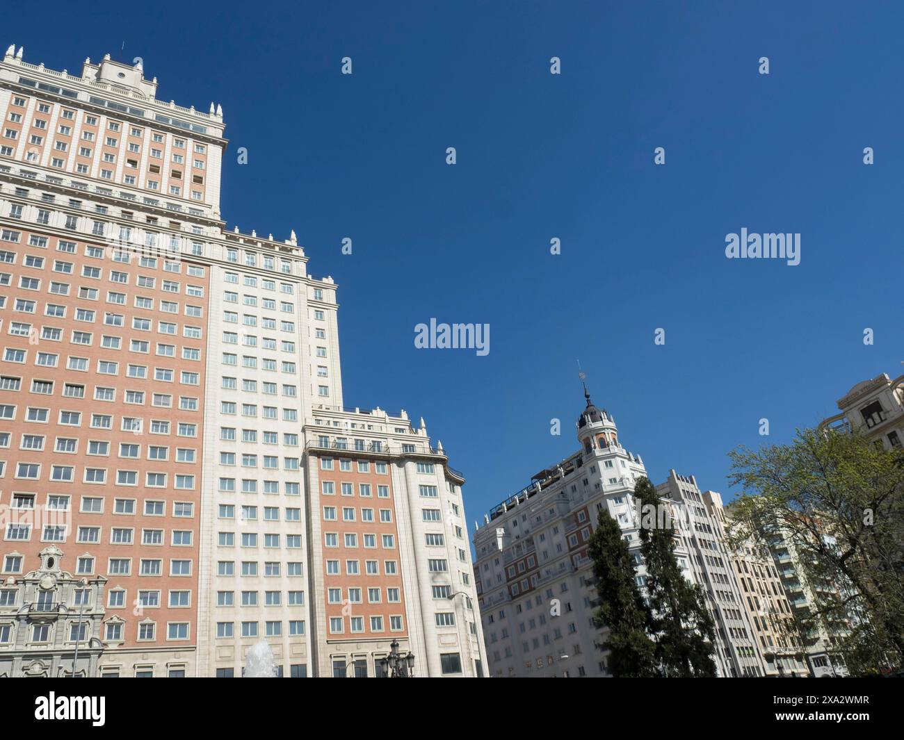 Modern skyscrapers and tall buildings against the clear blue sky in an ...