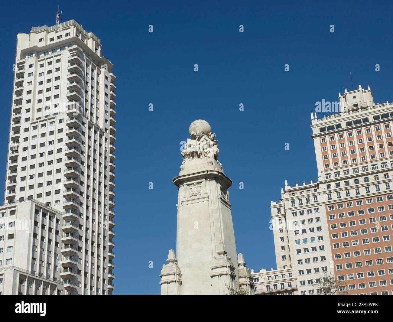 A monument amidst modern skyscrapers that together form an impressive ...