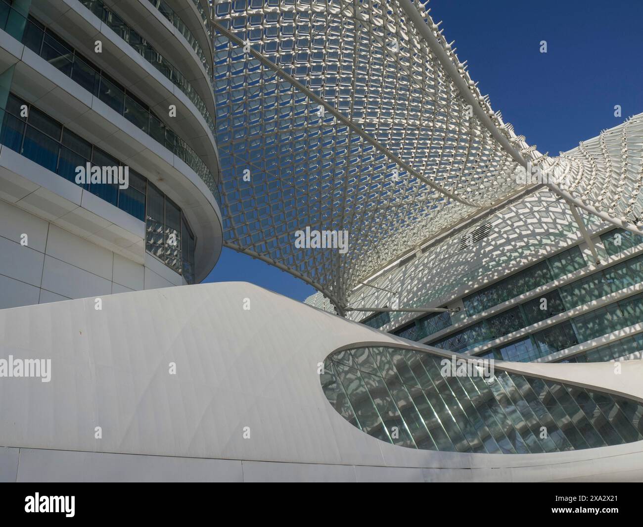 Close-up of a modern building with an impressive glass structure and ...