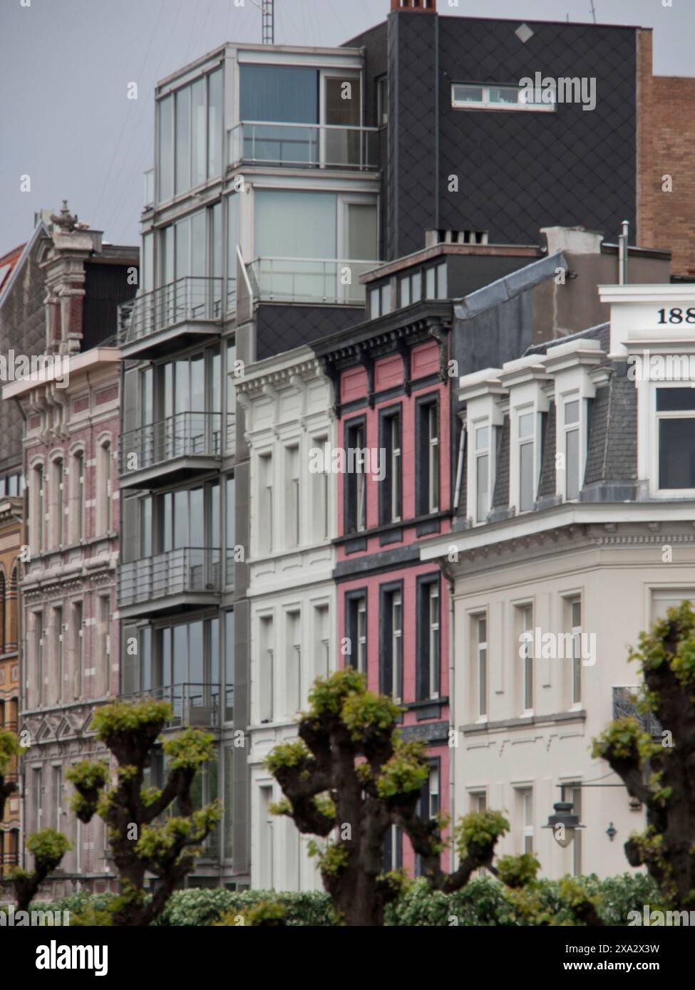 Terraced houses in different styles and colours with modern elements ...