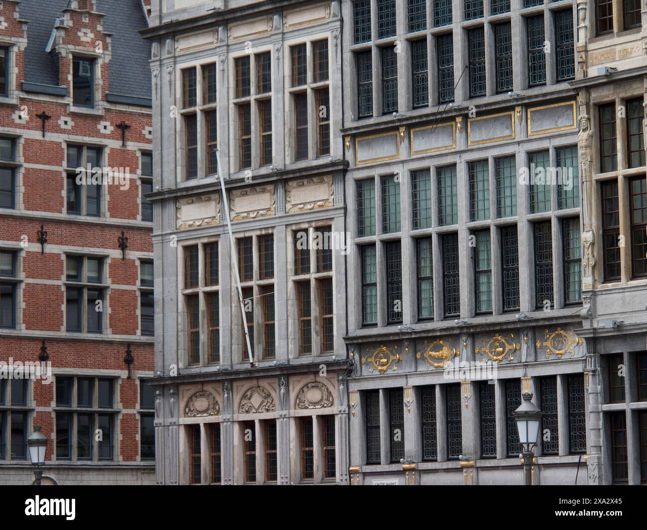 Row of historic buildings with ornate facades and rows of windows ...