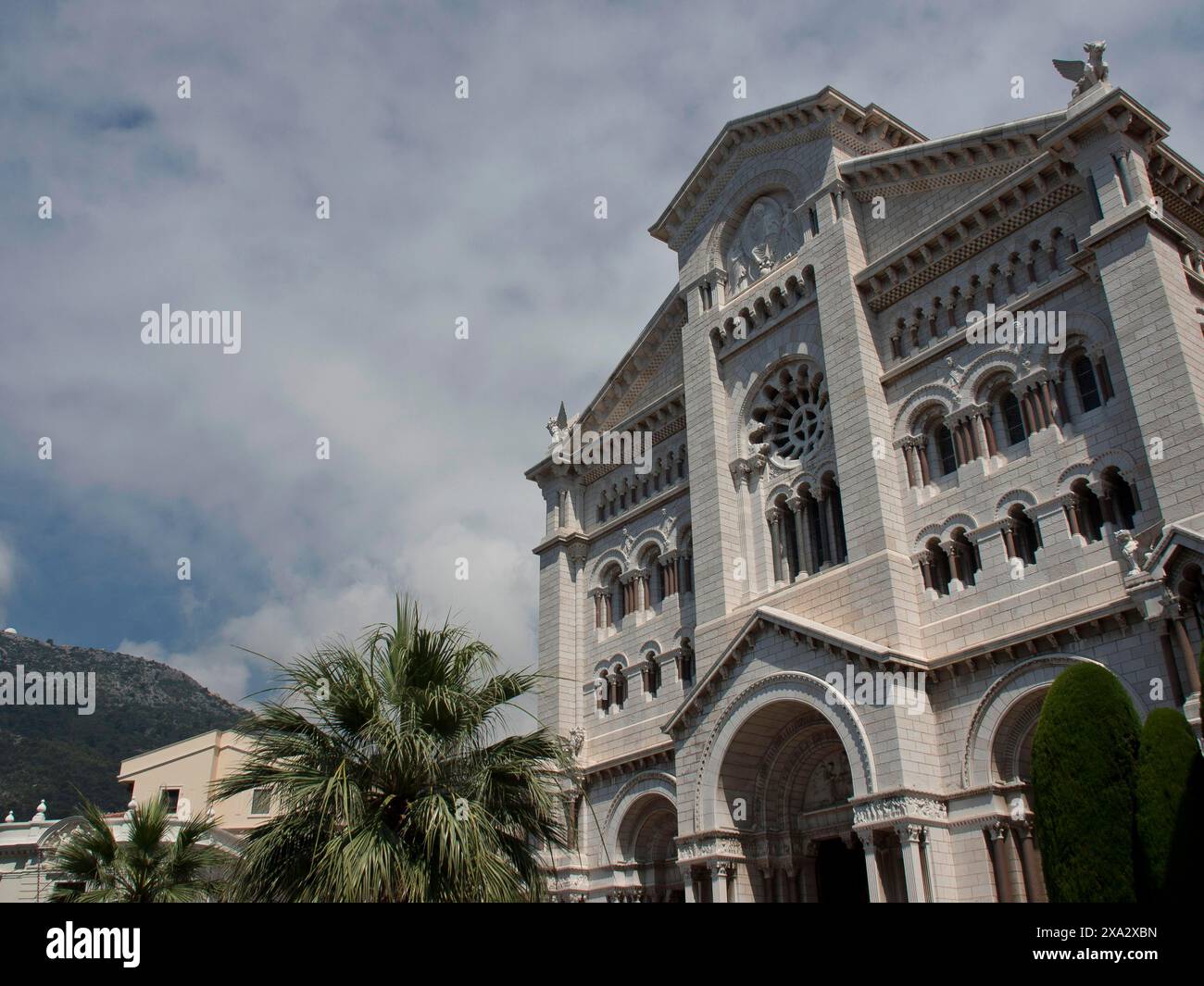 Gothic church with elaborate architecture, surrounded by palm trees ...