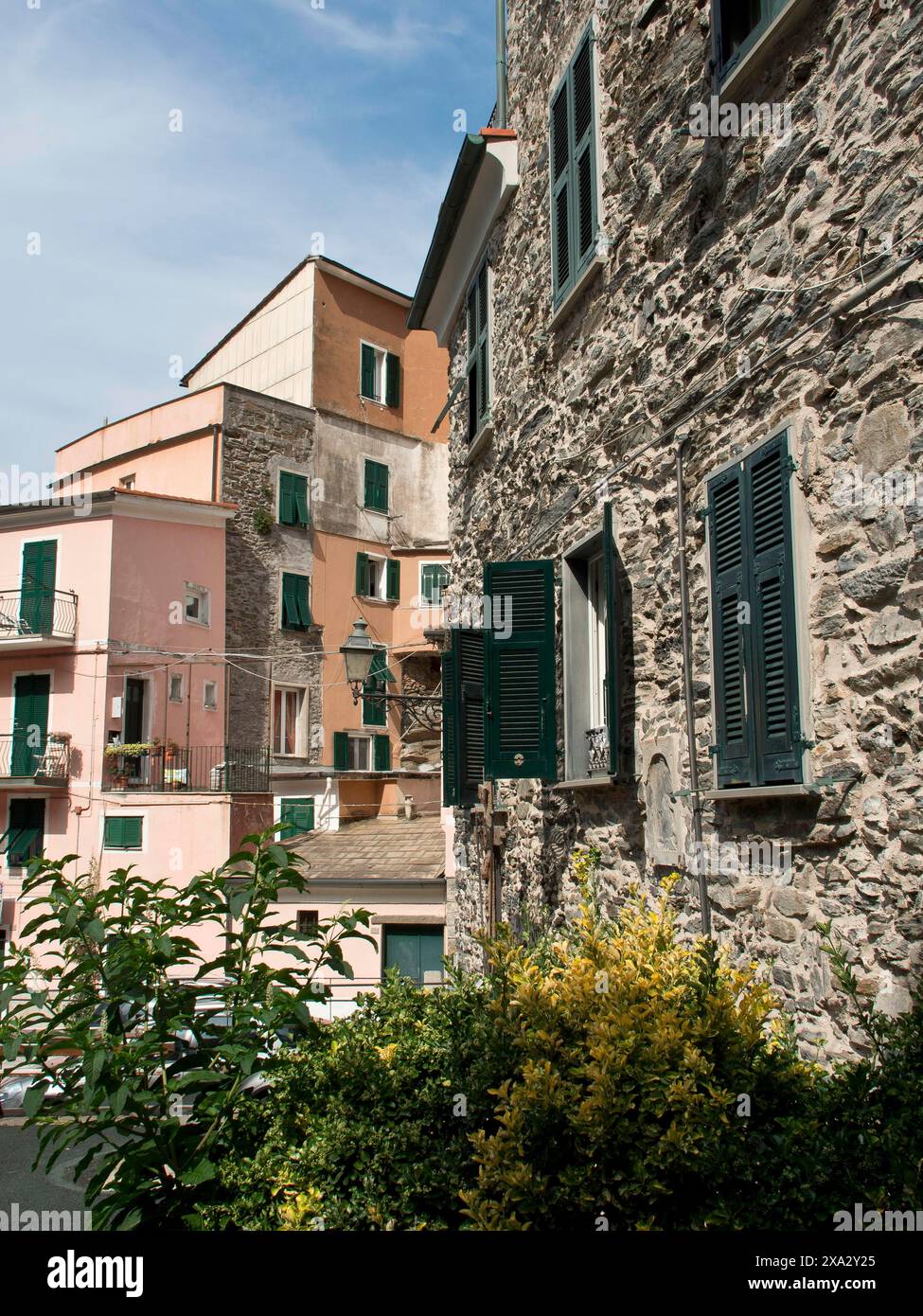 Traditional Italian building with shutters and stone walls in a village ...