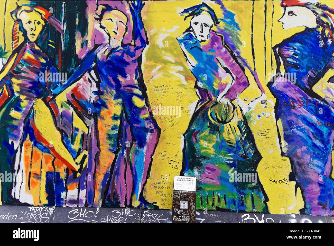 Colourful graffiti showing several dynamic dancers in a moving style ...