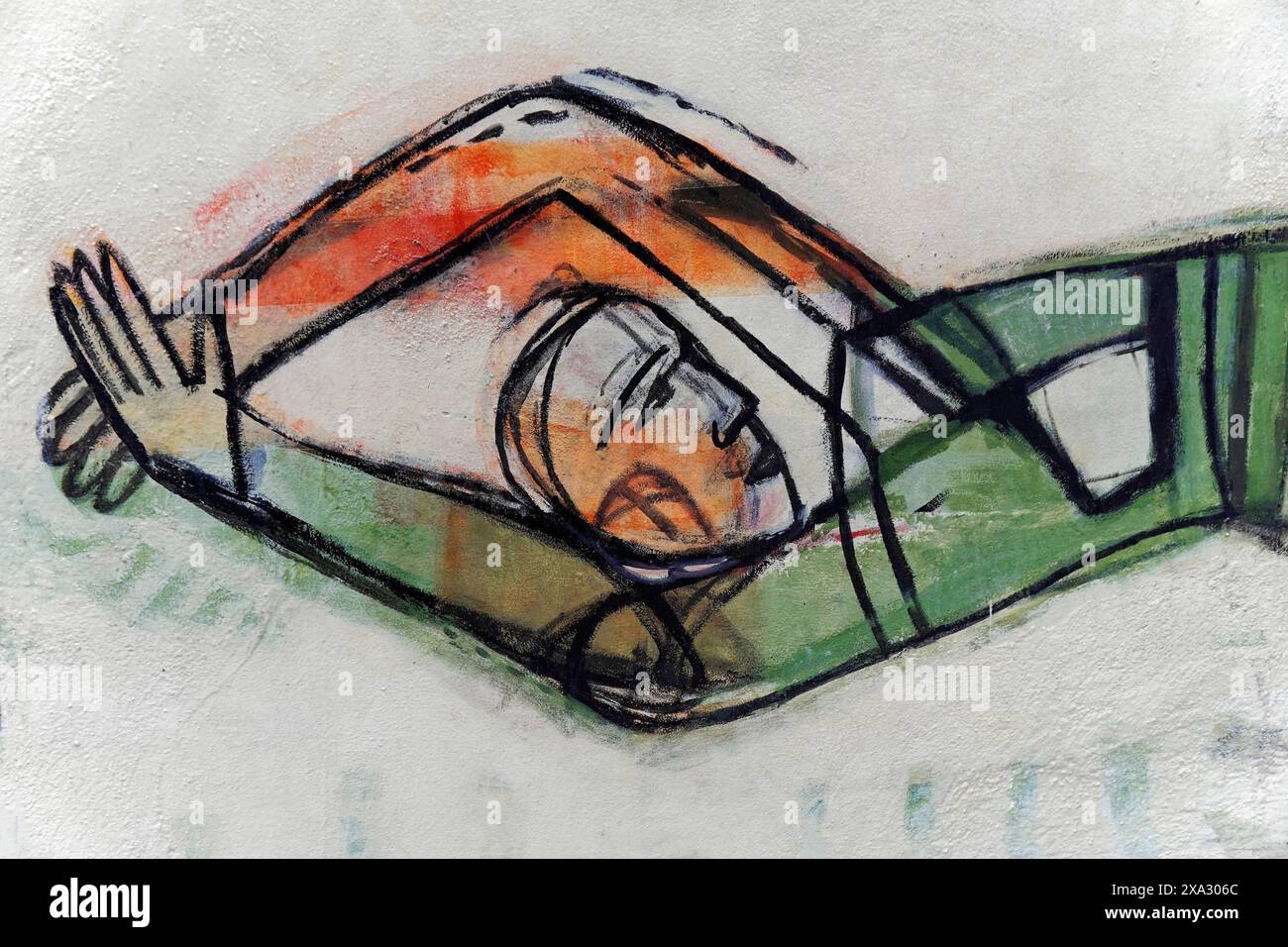 Abstract wall painting of a reclining figure in green and orange, wall ...