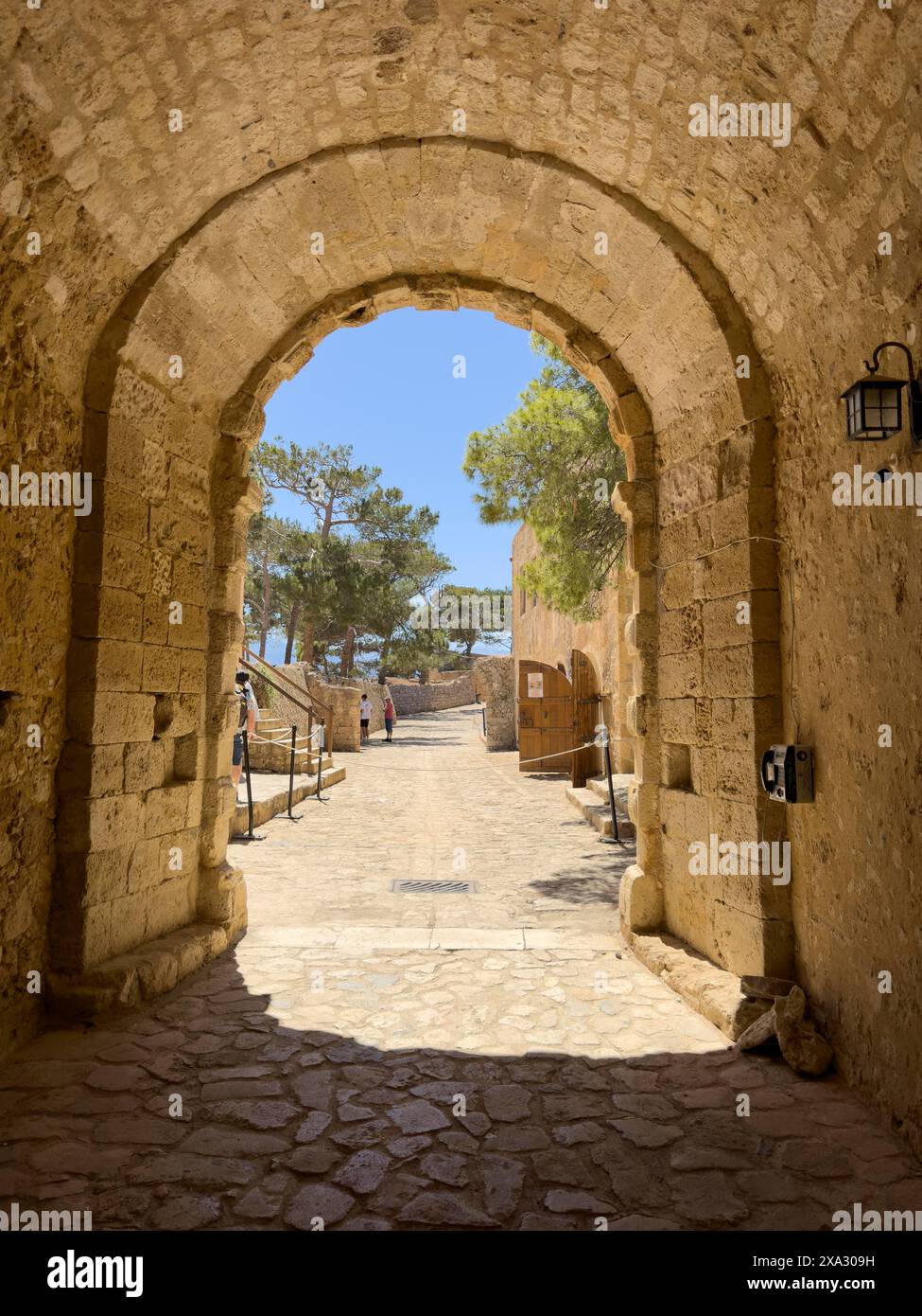 View through main gate entrance to ruins of historical fortress ...