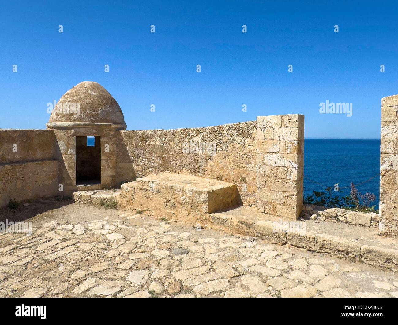 Round watchtower and wall with crenellated gap for guns one of 10 round ...