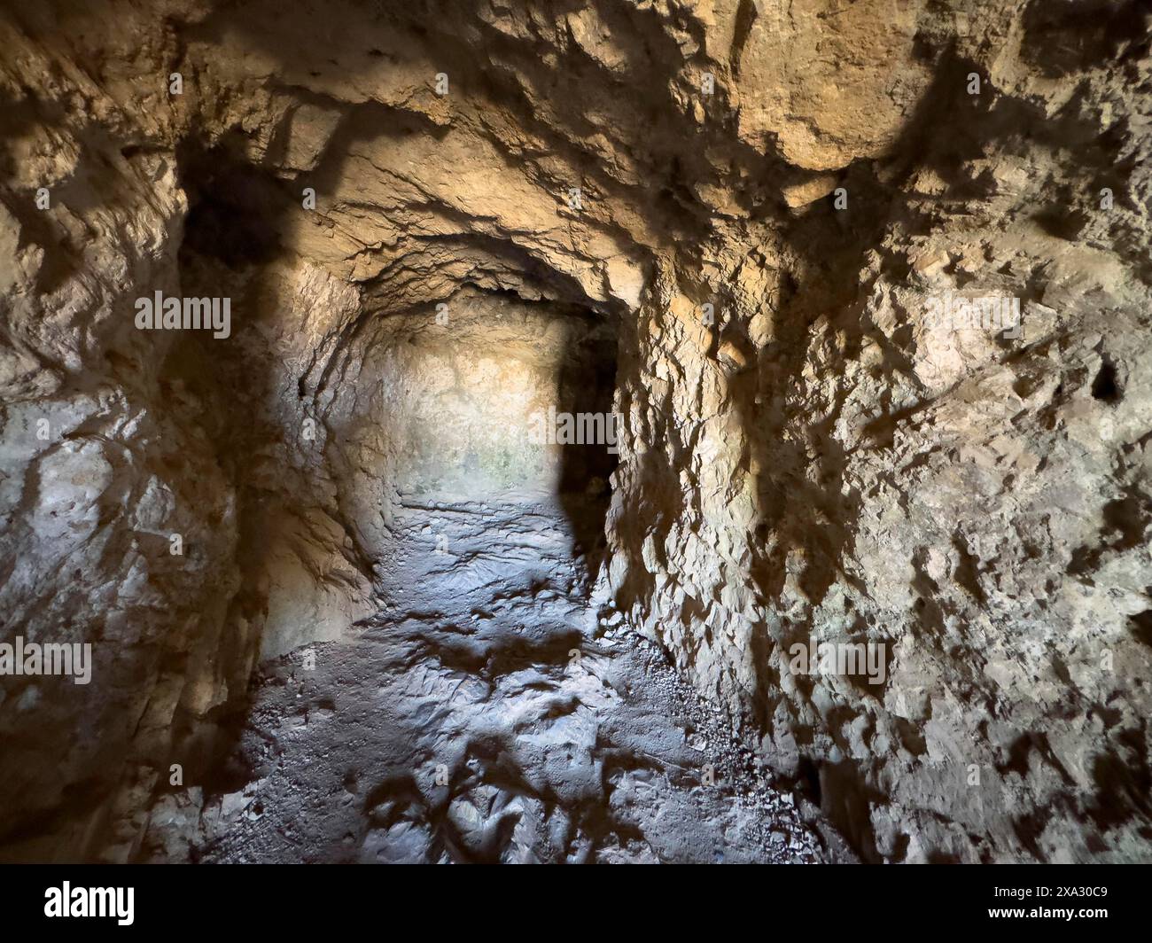 Cave with rock-cut passageway on the site of the historic fortress ...