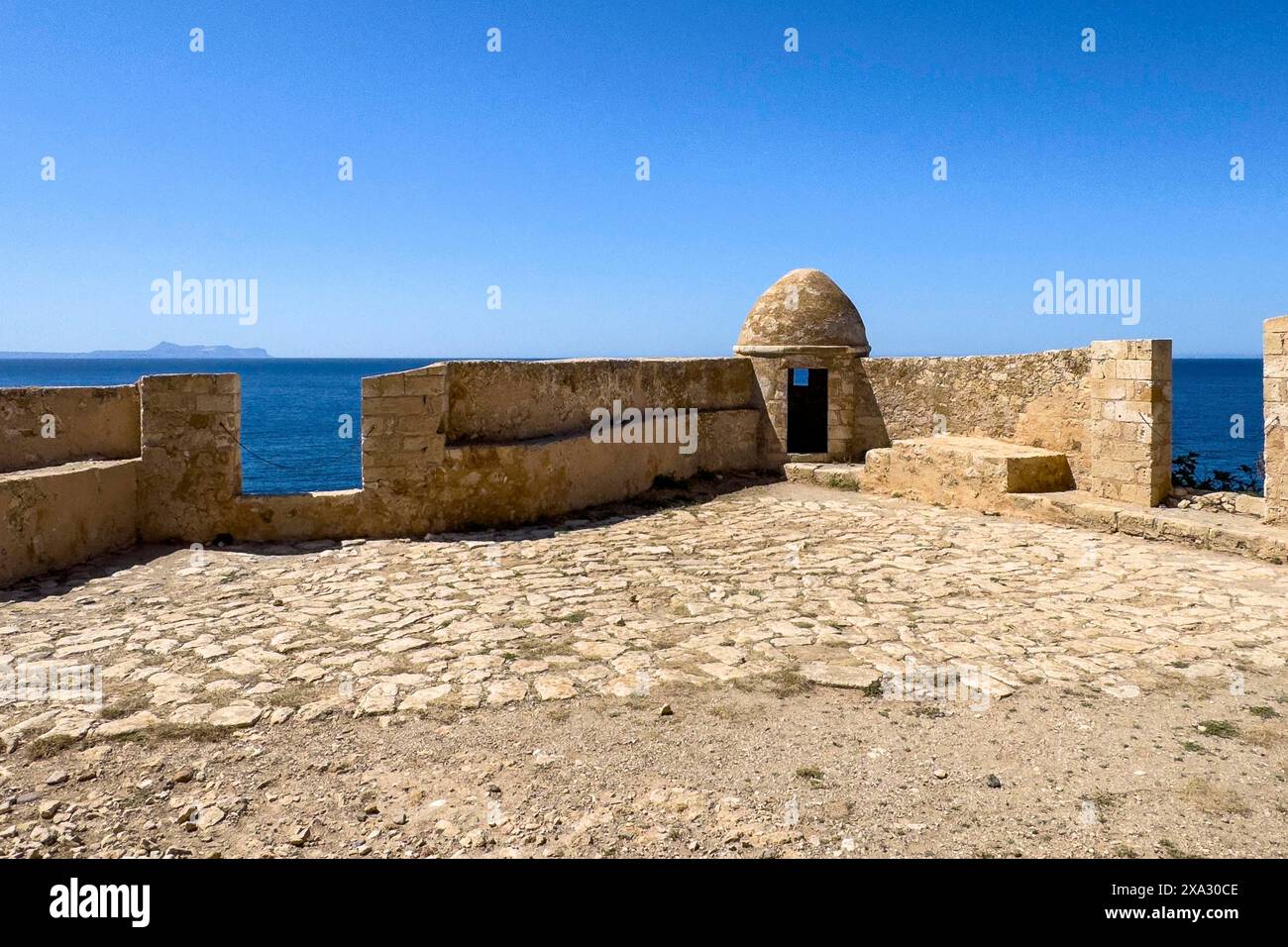 Round watchtower and wall with crenellated gap for guns one of 10 round ...