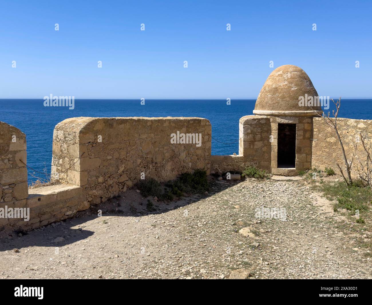 Round watchtower and wall with crenellated gap for guns one of 10 round ...