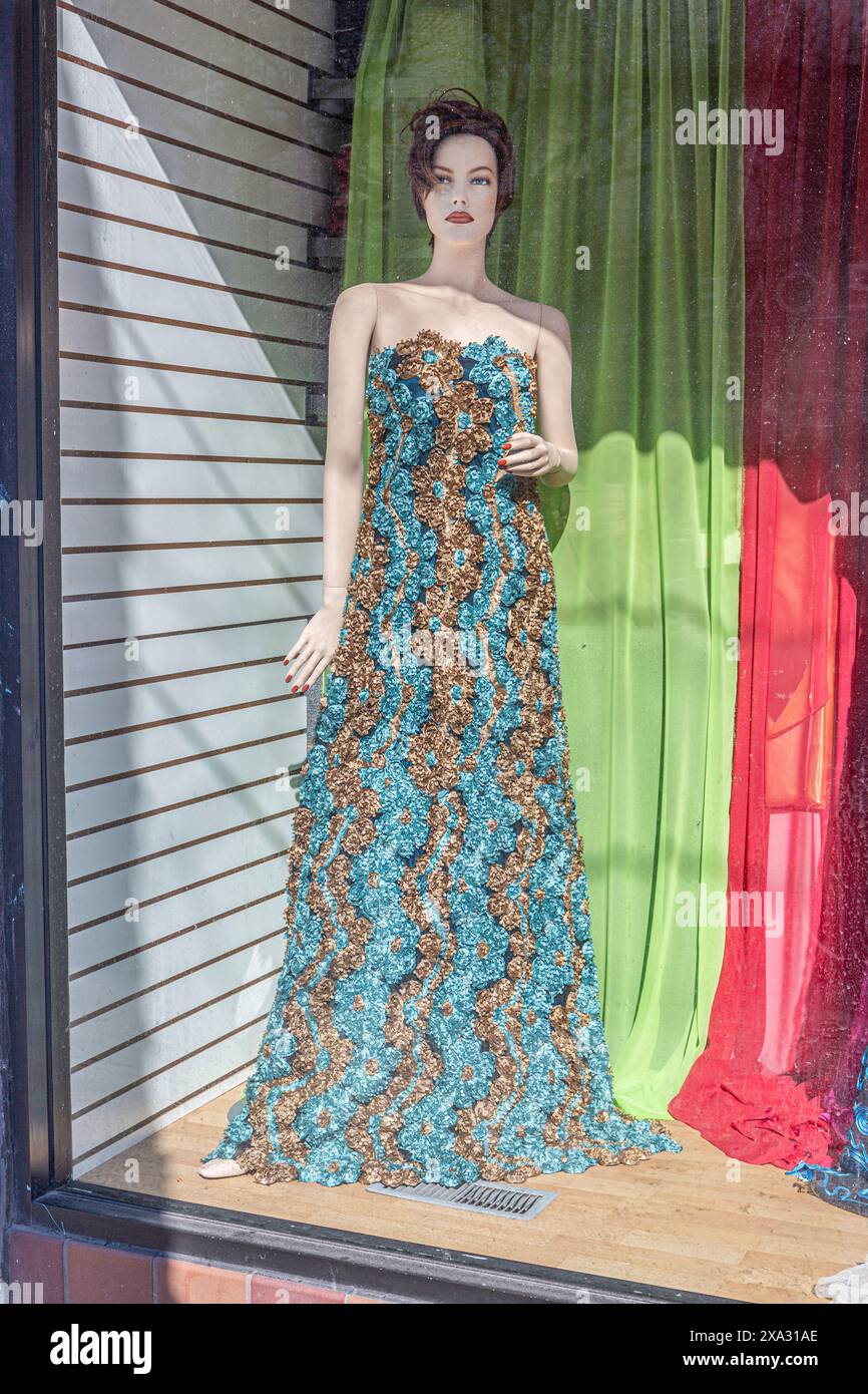 A female fashion mannequin in a shop window display Stock Photo - Alamy