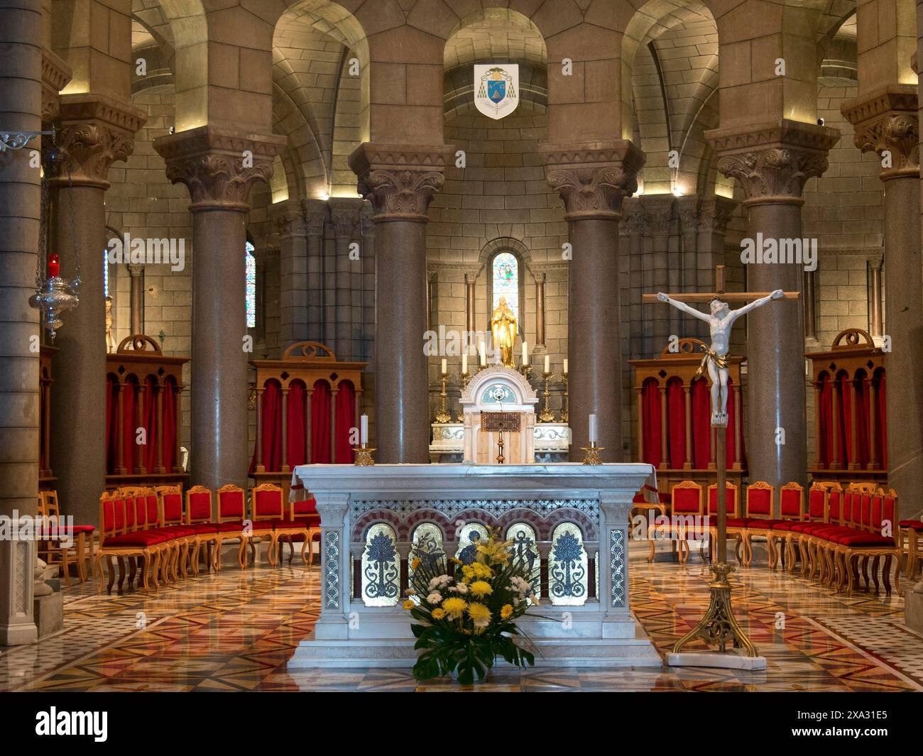 Religious interior with altar, crucifix and decorative chairs, Monte ...
