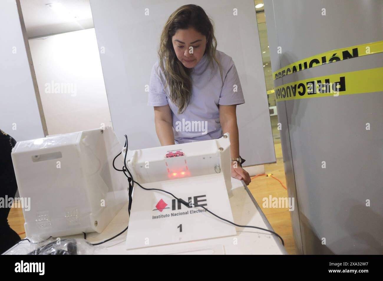 Voting for the Mexico s General Elections A Mexican citizen casting his ...