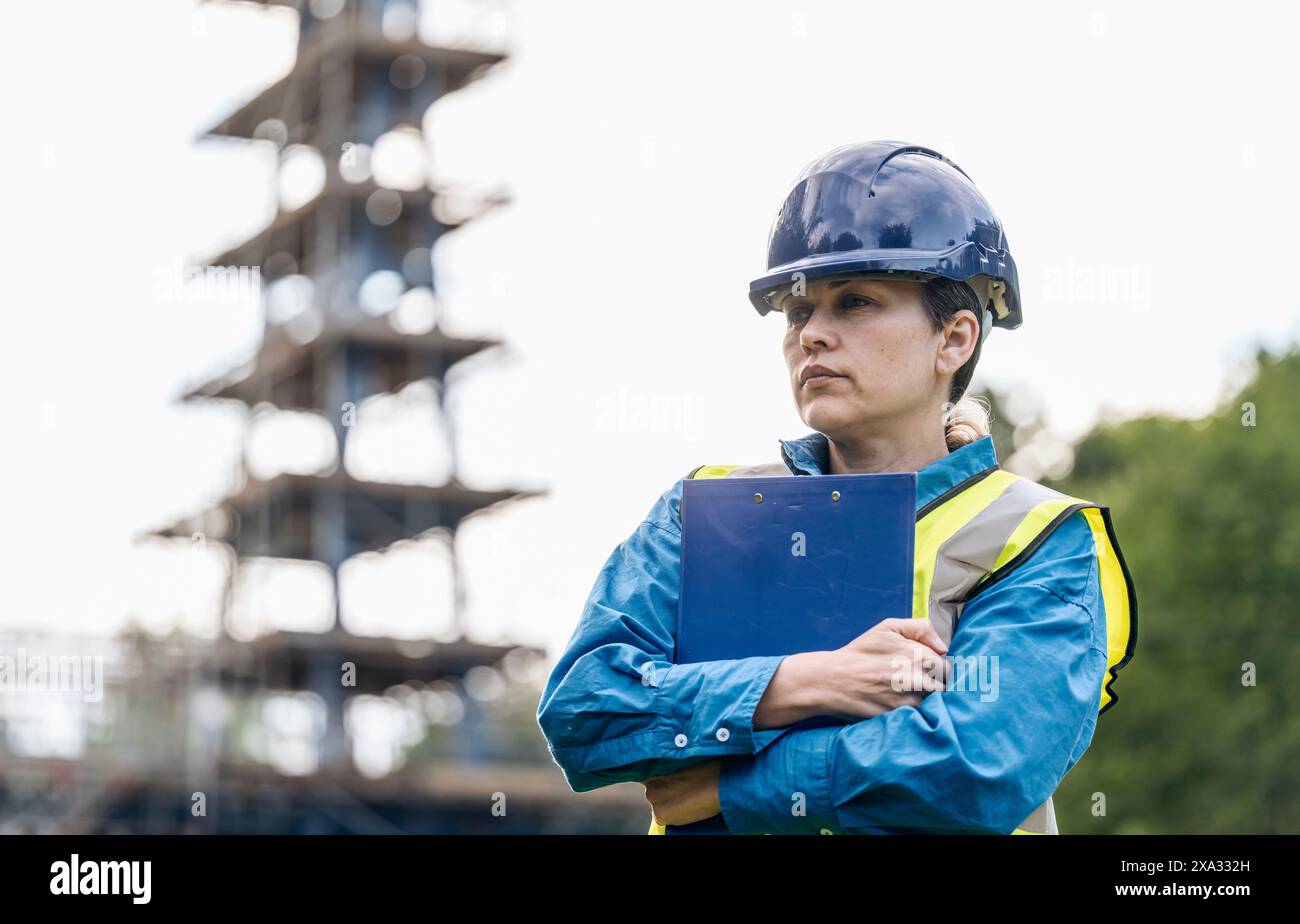 Female site engineer surveyor working with theodolite total station EDM ...