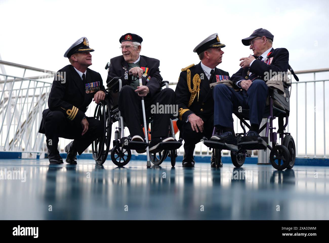 (left to right) Royal Navy Commander Glen Hinson, D-Day veteran Jim ...