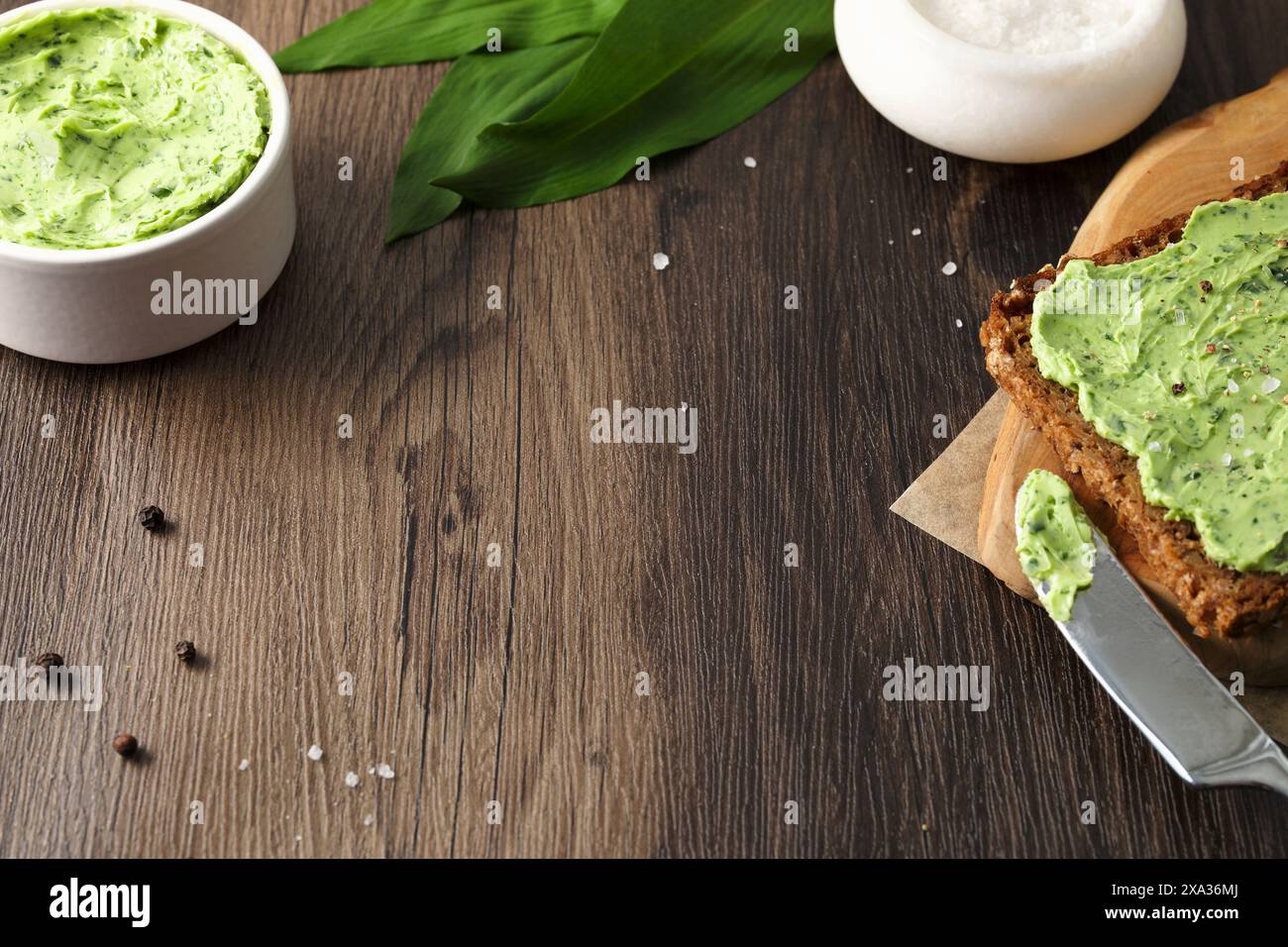 Wild garlic butter on wholemeal bread Stock Photo - Alamy