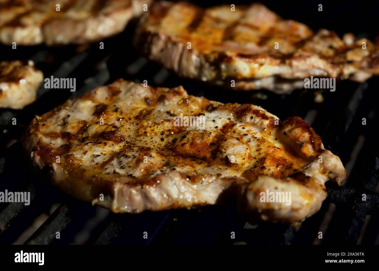 Grilled pork neck steaks Stock Photo - Alamy