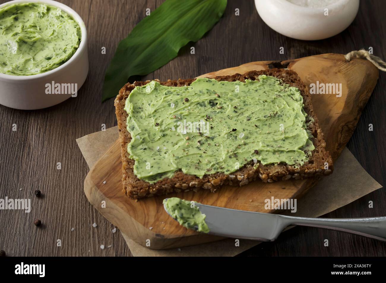 Wholemeal bread with wild garlic butter Stock Photo - Alamy
