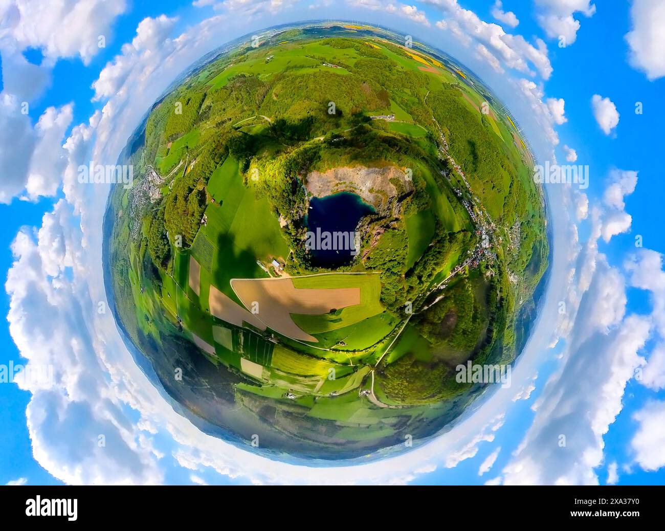 Aerial view, lake in the mountain, circular quarry lake in the ...