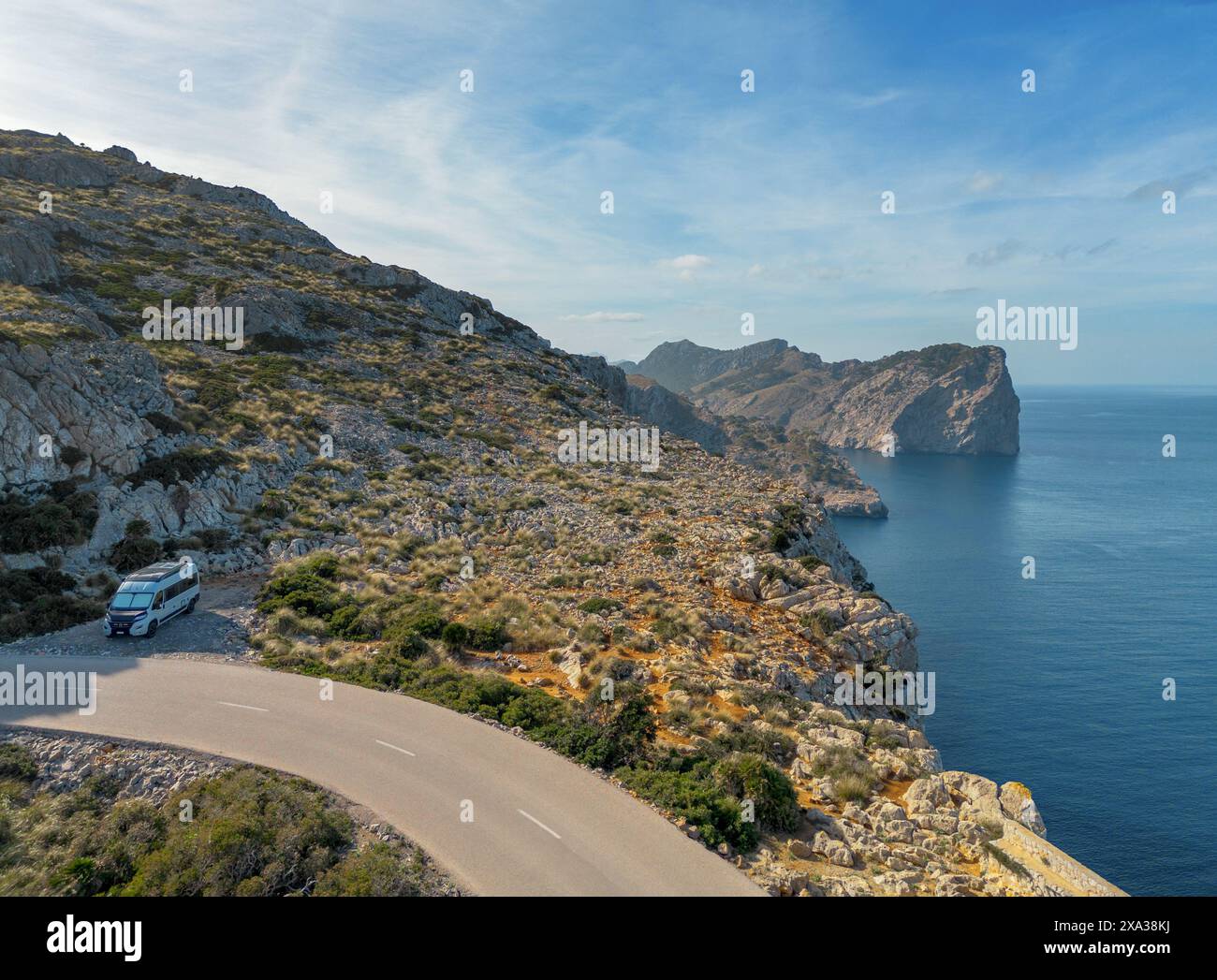 A camper van on the curvy mountain road leading to Cap de Formentor in ...