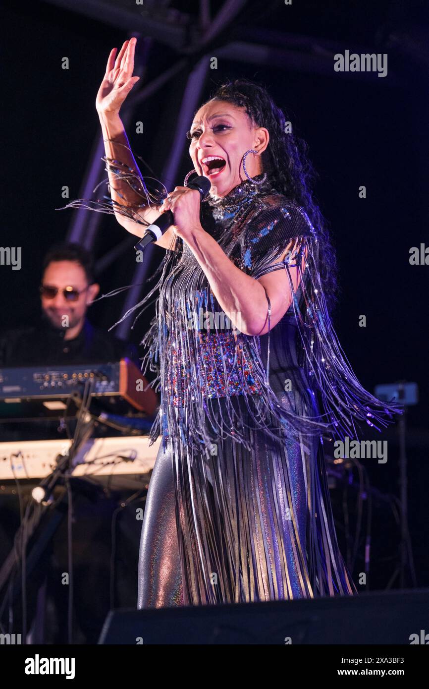 Debbie Sledge of Sister Sledge performing at Wychwood Festival ...