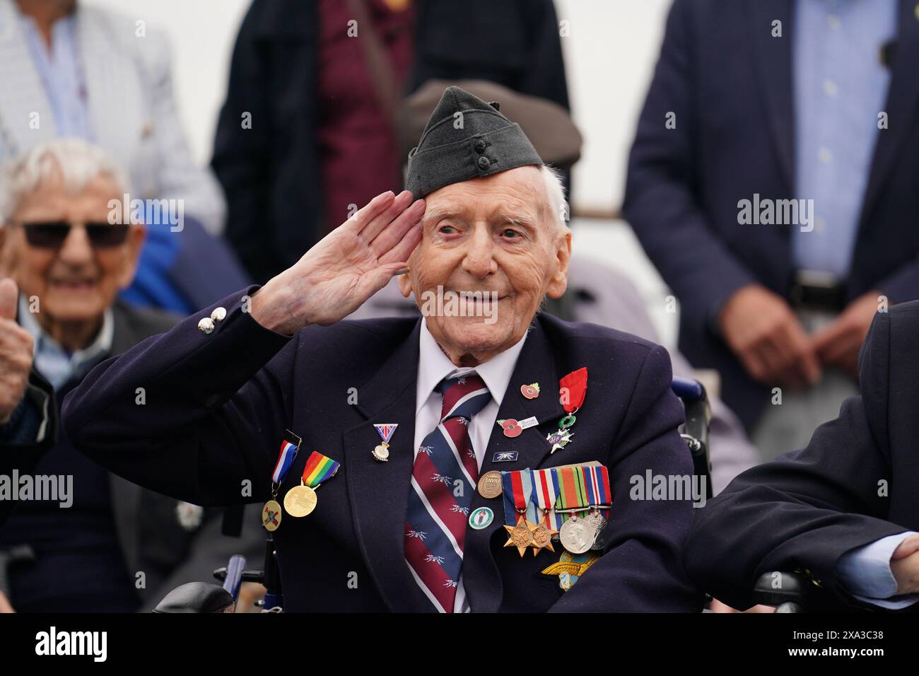 100-year-old D-Day veteran Bernard Morgan, from Crewe, salutes on board ...