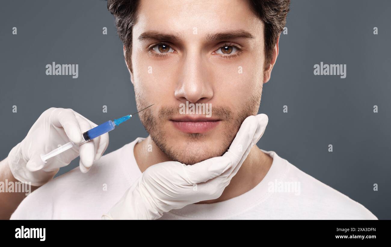 Plastic surgery concept. Man receiving injection in his face Stock ...