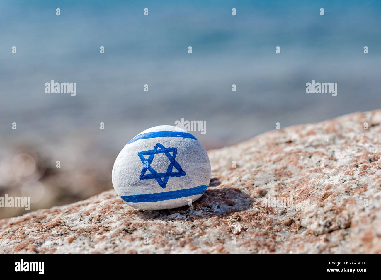 Israeli flag painted rock. Hand painted stone with Magen David. Blue ...