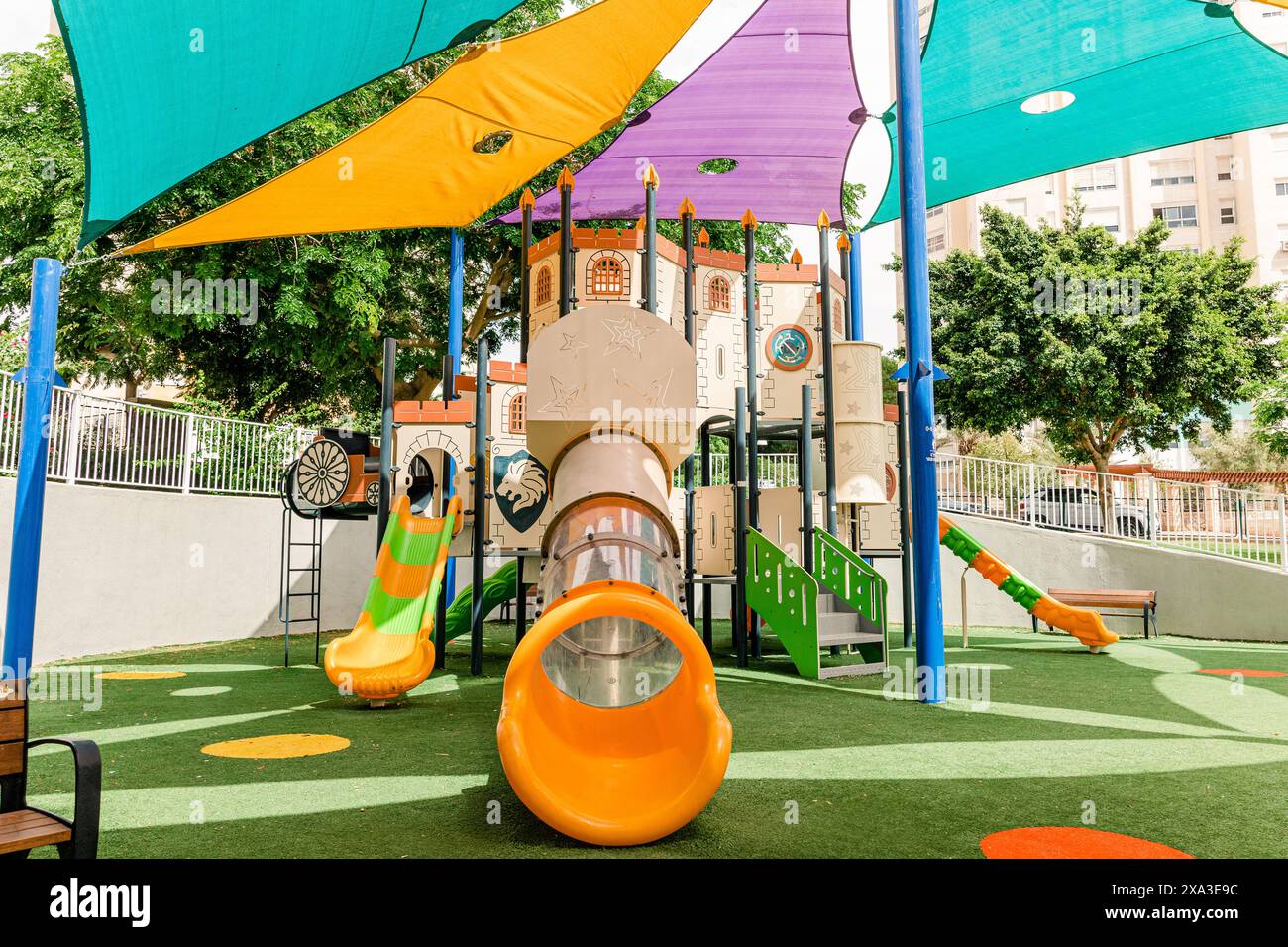 Modern colorful children's playground with canopy. Children's castle ...