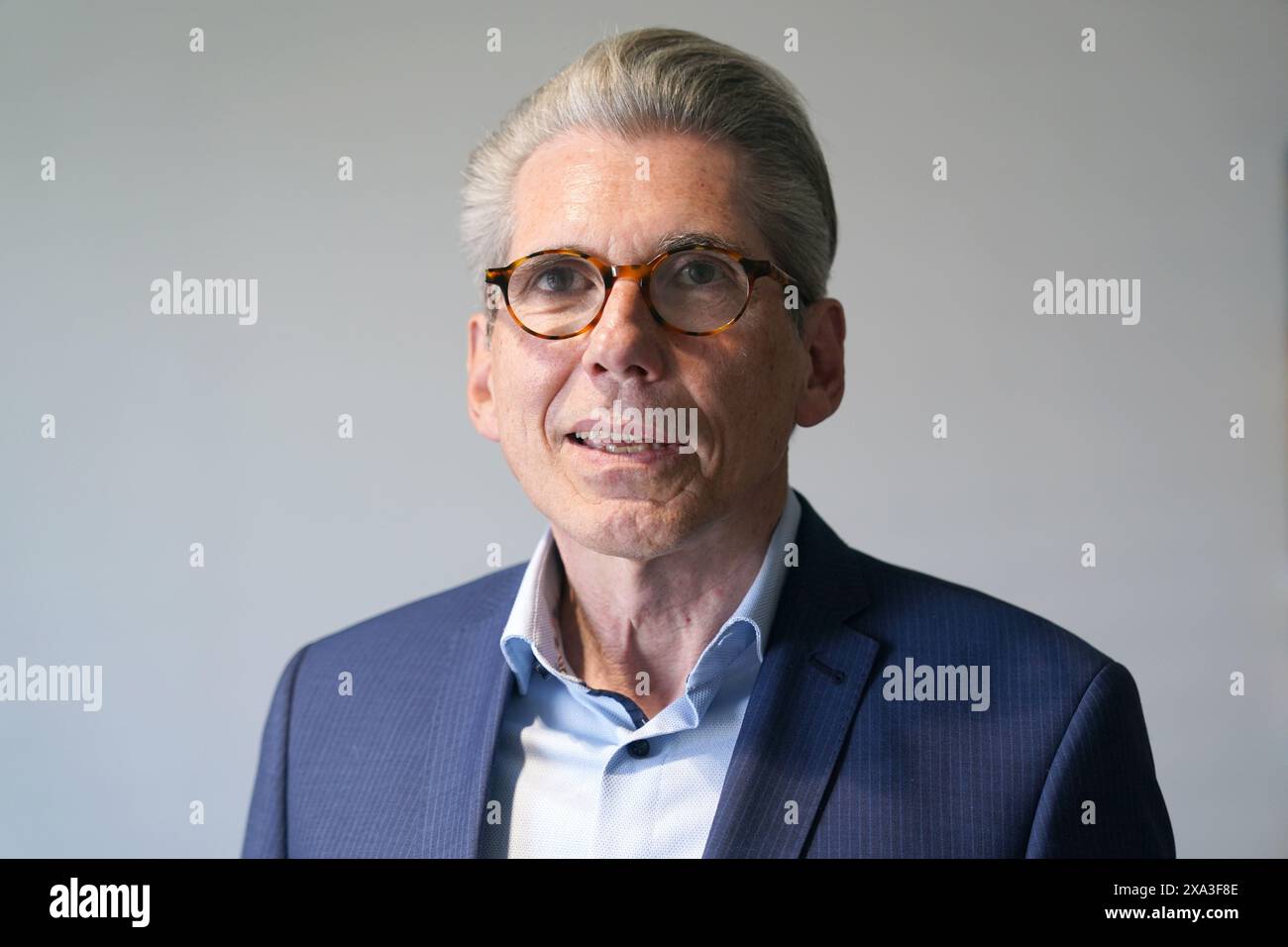 Hamburg, Germany. 27th May, 2024. Andreas Storm, CEO of DAK-Gesundheit, stands in the company ...