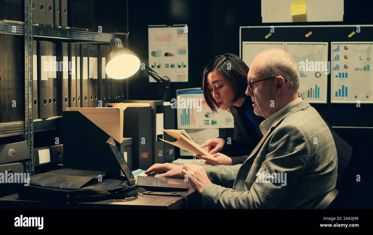 Investigators studying historical maps of crime scenes using federal ...