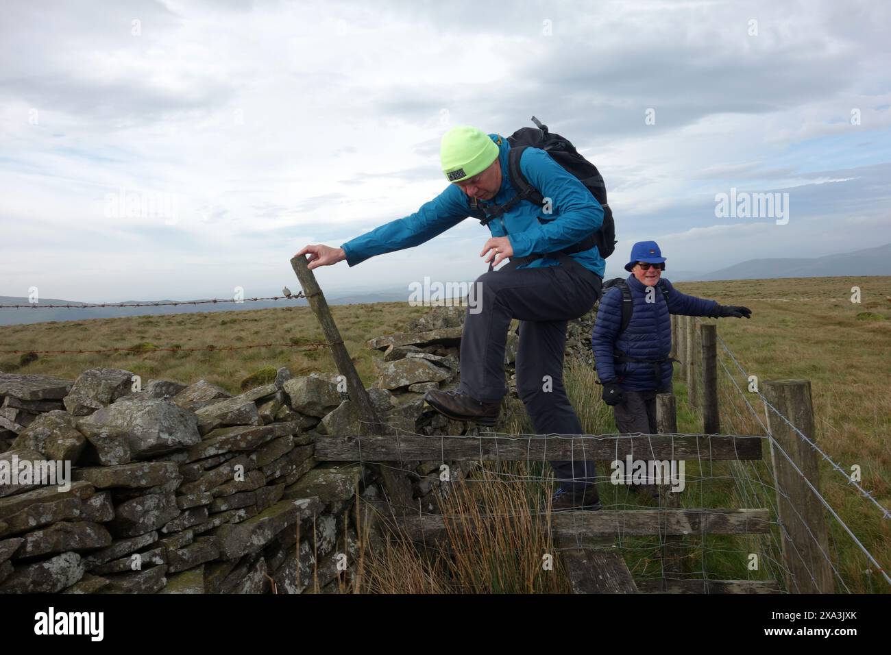 Climbing over fence hi-res stock photography and images - Alamy