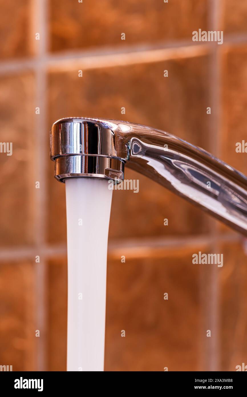 Water pouring from faucet sink hi-res stock photography and images - Alamy