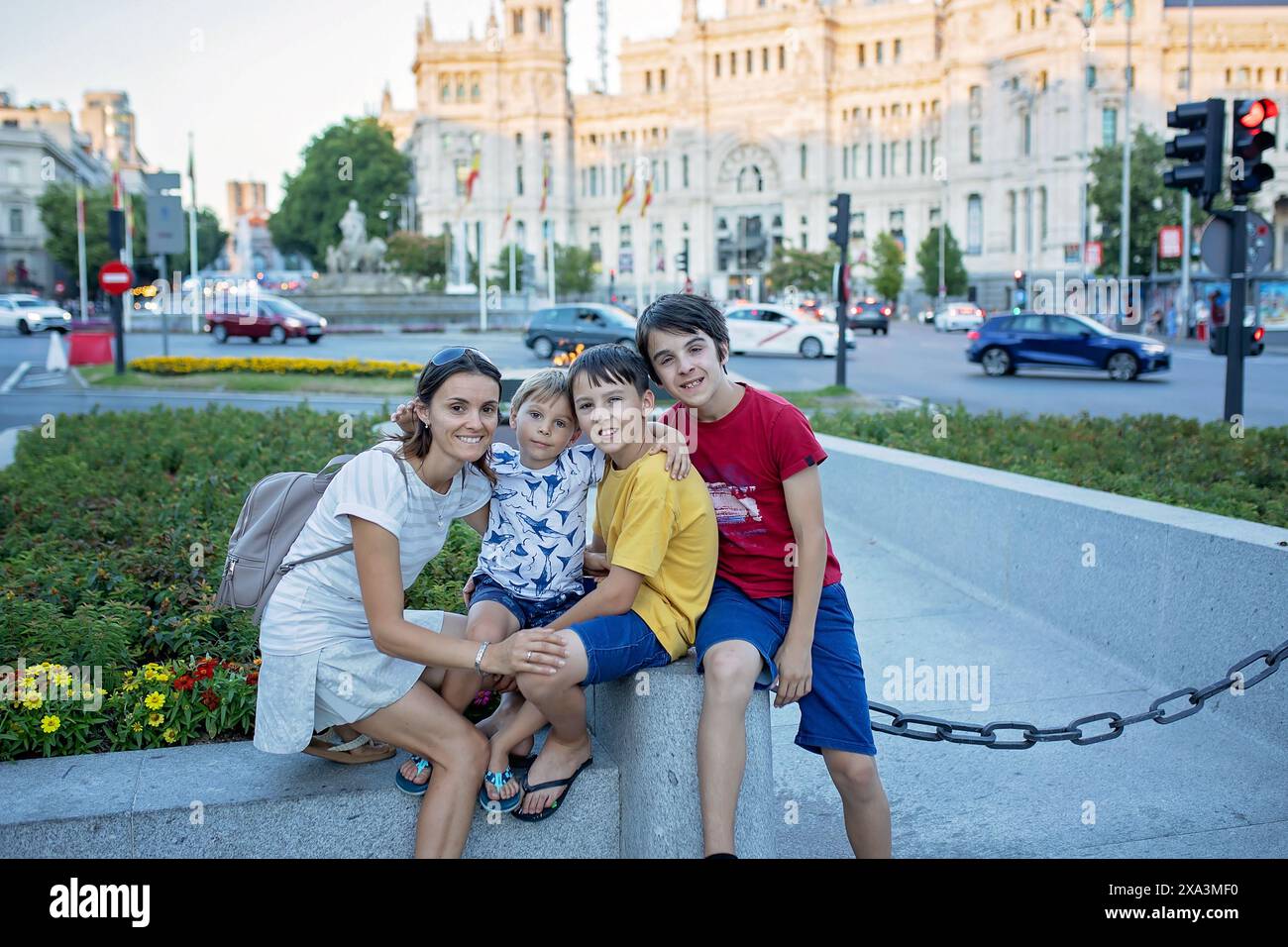 Family with children, siblings, visiting Madrid during family vacation ...