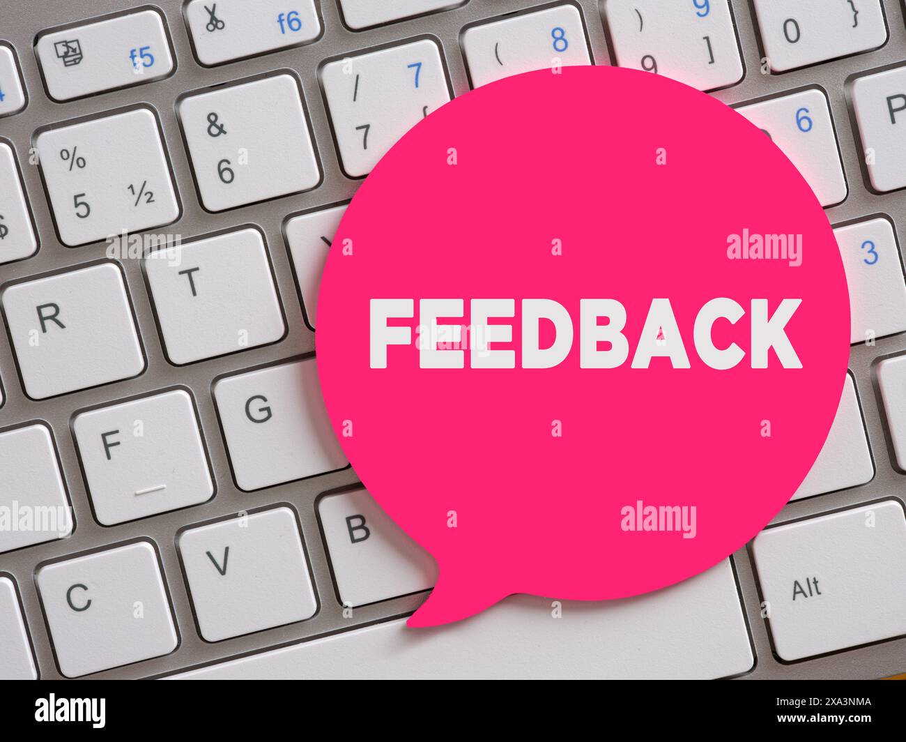 The word feedback on speech bubble over computer keyboard Stock Photo ...
