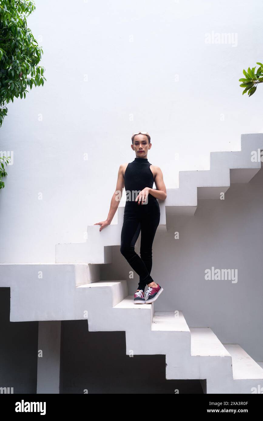 Full body portrait of a beautiful Asian queer LGBT community supporter ...