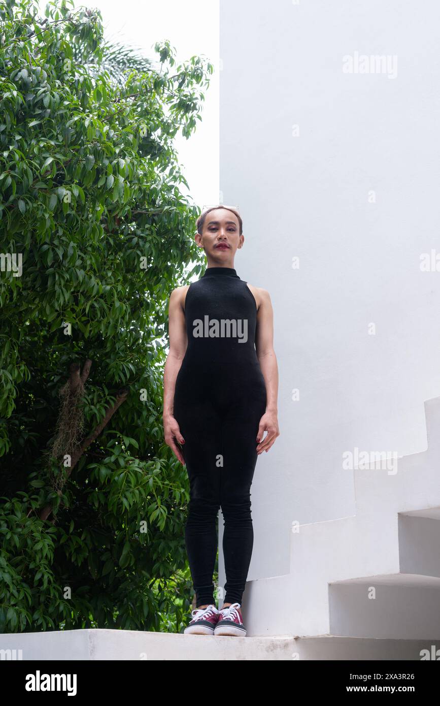 Full body portrait of a beautiful Asian queer LGBT community supporter ...