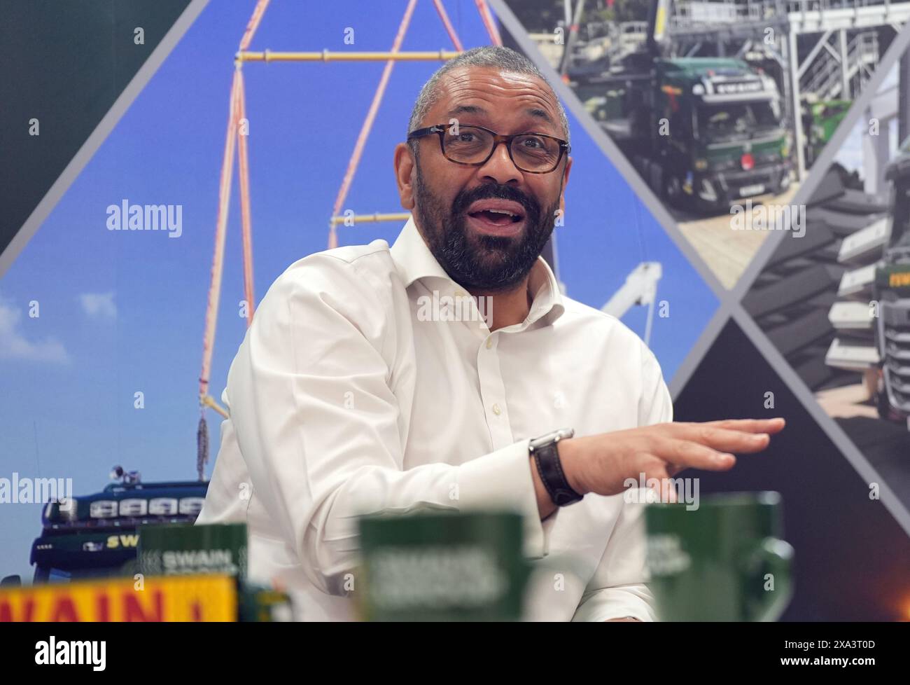 Home Secretary James Cleverly meeting staff during a visit to Swain ...