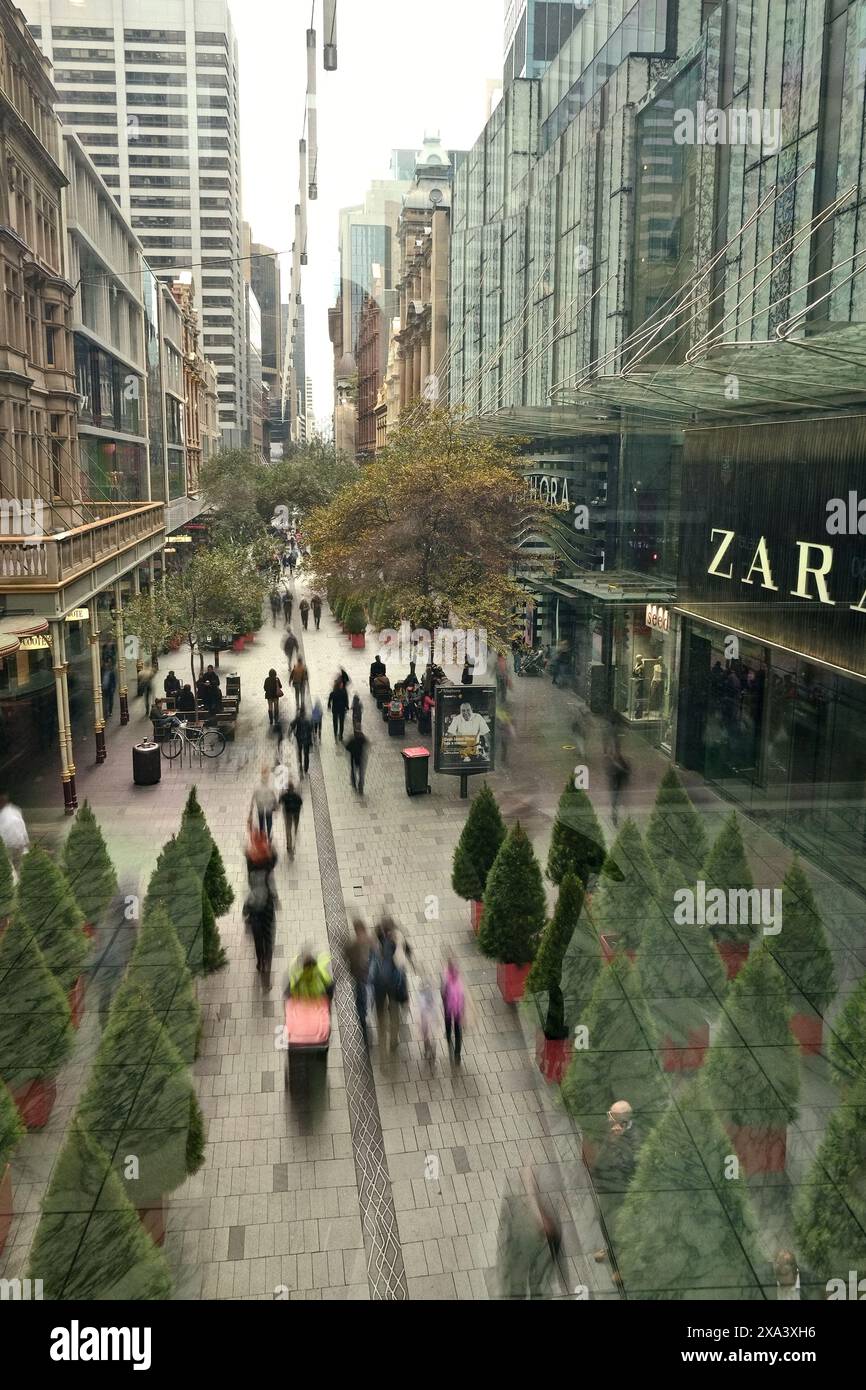 Christmas in July in Sydney's Pitt Street shopping mall, rows of ...