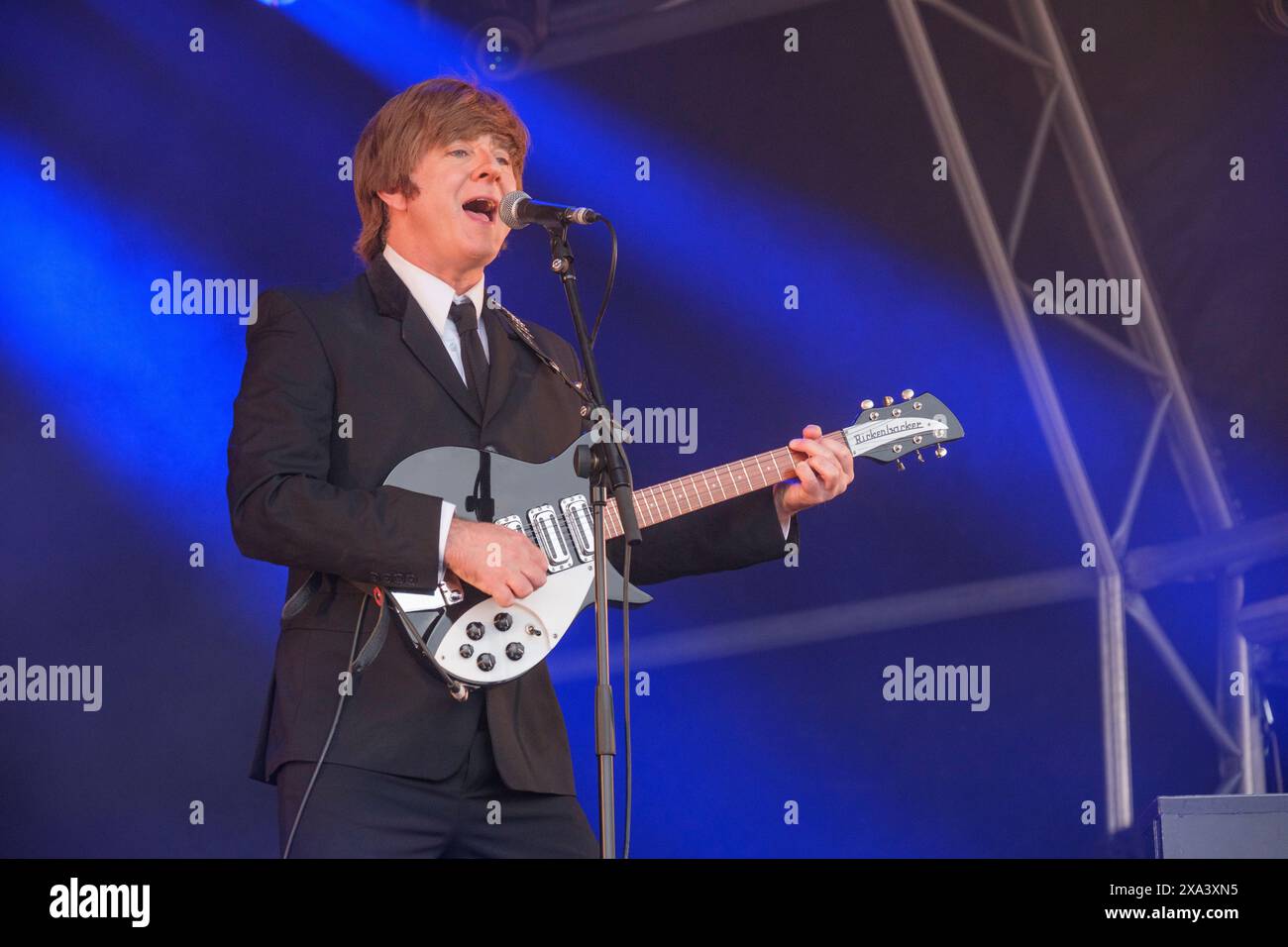 Paul Canning (John Lennon) of The Bootleg Beatles performing at ...