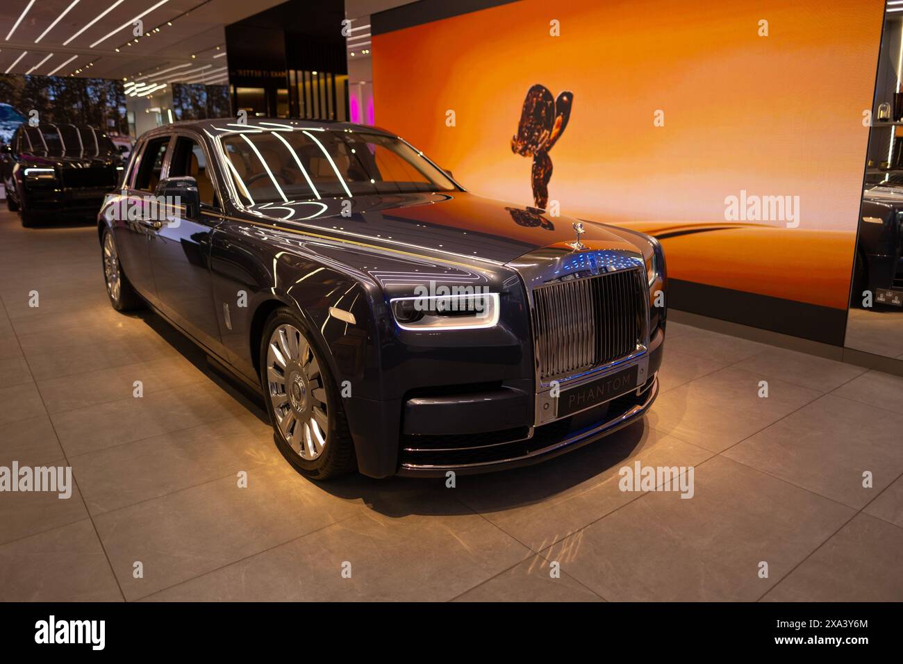 British black luxury limousine Rolls-Royce Phantom VIII with four-wheel ...