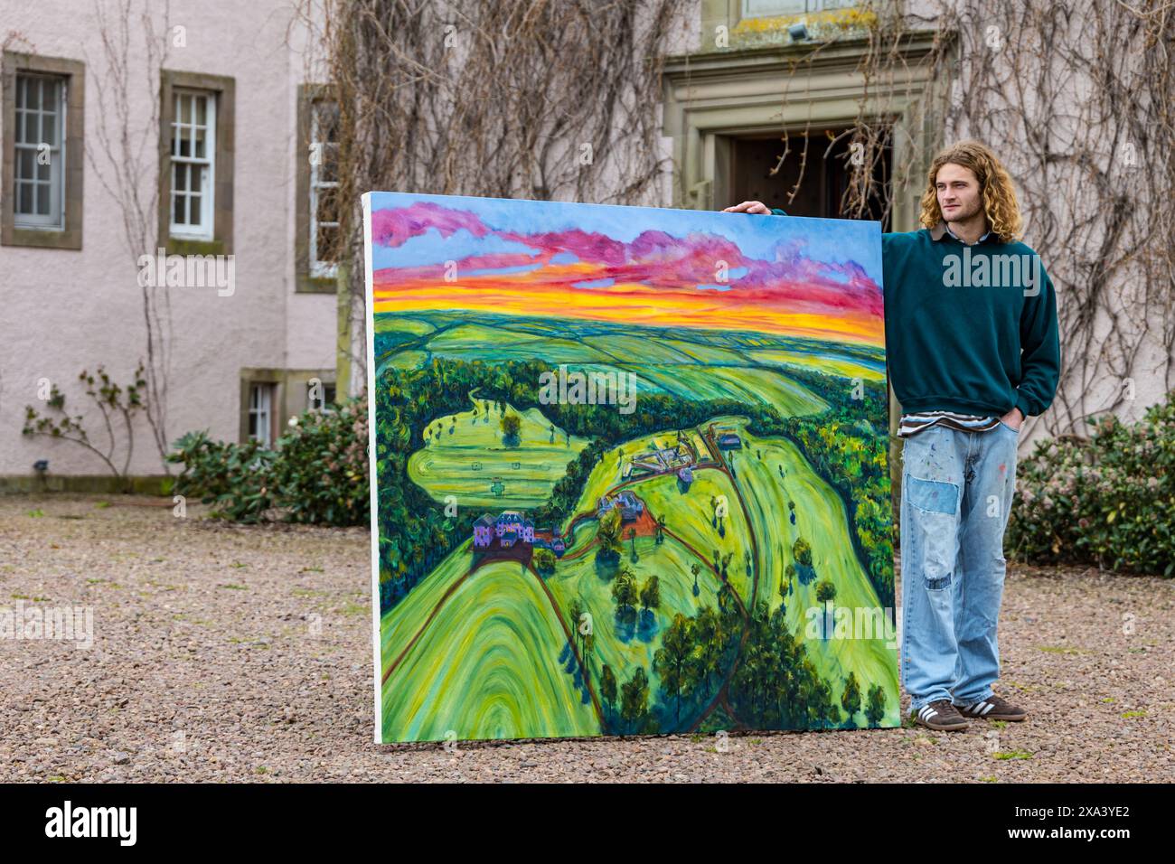 Artist Joe Grieve with one of his large colourful paintings at the ...