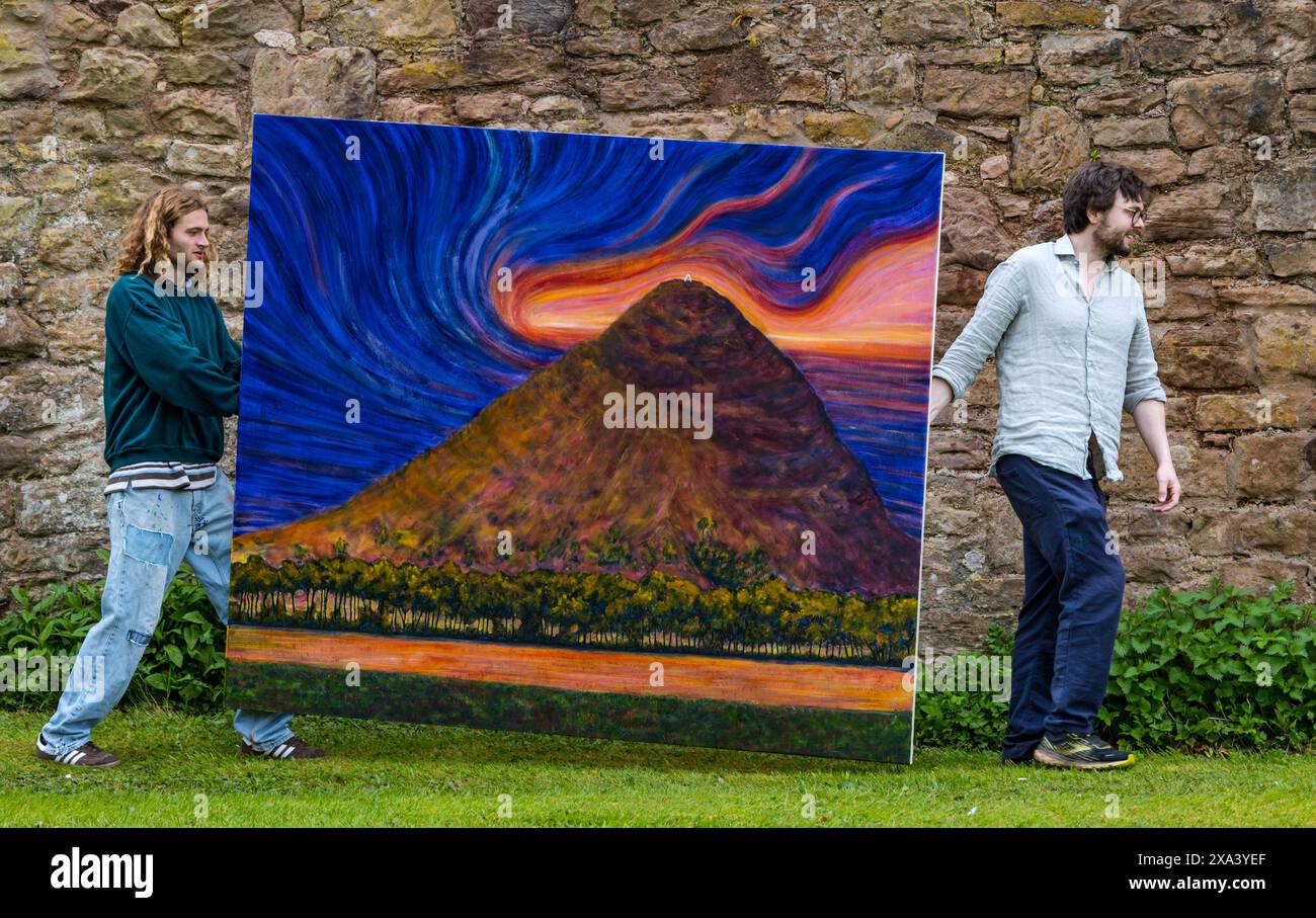 Artist Joe Grieve with one of his large colourful paintings at the ...