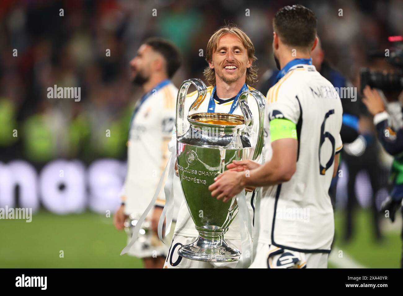 Luka Modric of Real Madrid is seen with the trophy - Borussia Dortmund ...