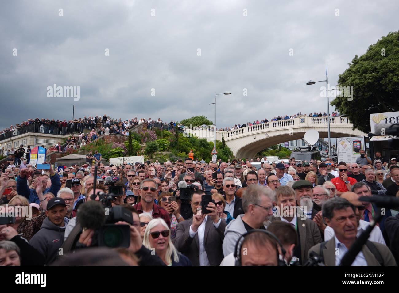 Crowds listen as Leader of Reform UK Nigel Farage launches his General ...
