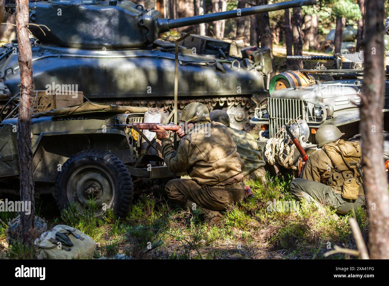 Historical reconstruction. American infantry soldiers of WWII fight in ...